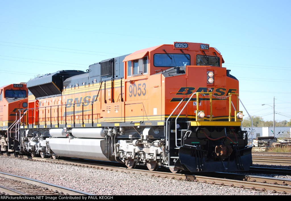 BNSF 9053 and BNSF 6438 as they roll eastward with a Loaded Coal Train.
